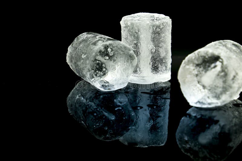 Ice Cubes and Reflections on Black Background Stock Image - Image of ...