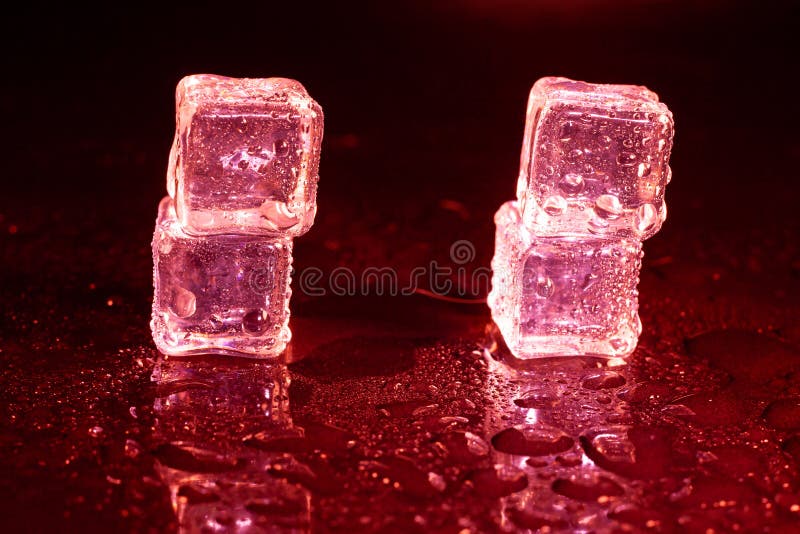 Ice Cubes on a Reflections Red Light Stock Photo - Image of melting ...