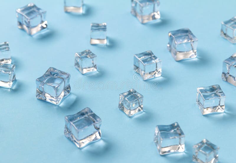 Ice Cubes Scattered on a Light Blue Background. Stock Image - Image of ...