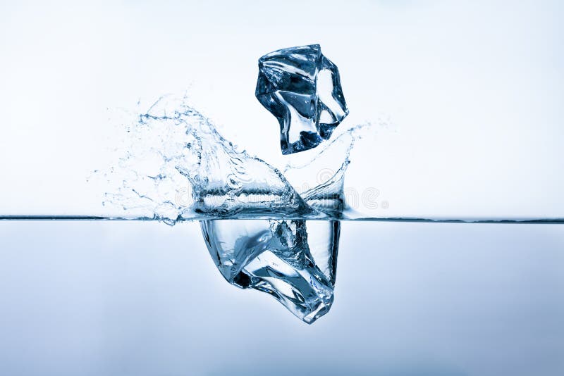 Ice Cubes Splashing into Clear Water Stock Photo - Image of energy ...