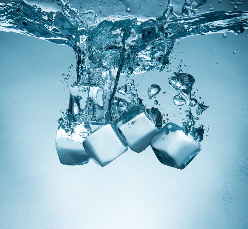 Ice Cubes Splashing into Water Stock Image - Image of backdrop, texture ...
