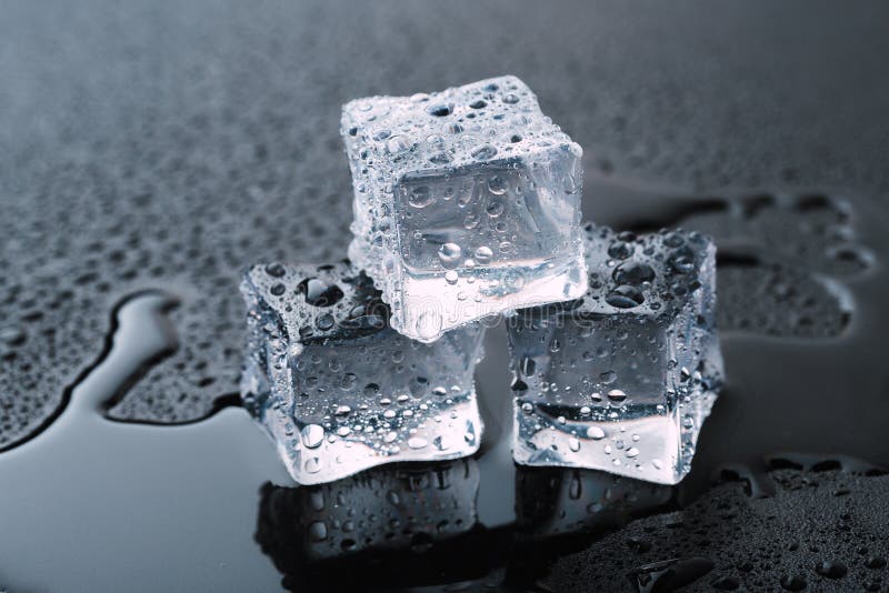 Pyramid of Beautiful Thawed Ice Cubes with Drops of Water Stock Photo ...