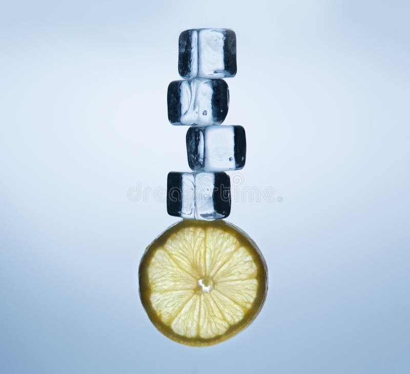 Ice Cubes Stand on a Fresh Lemon. Stock Image - Image of clean ...