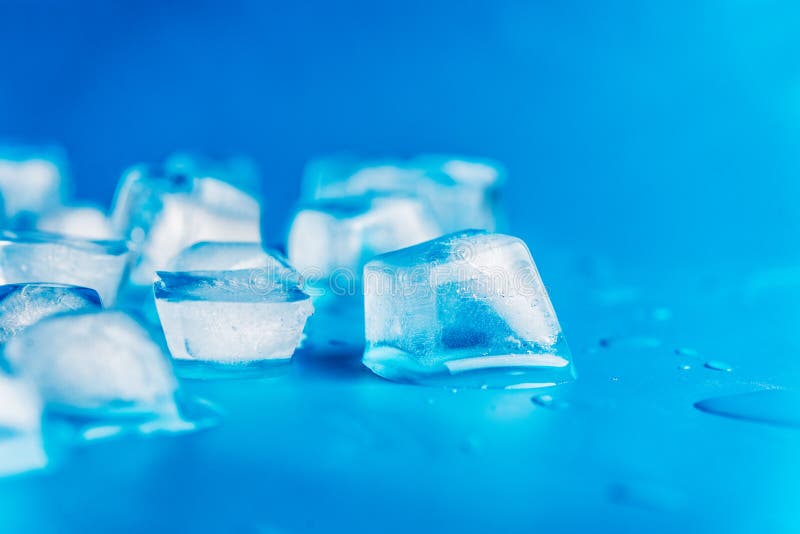 Ice cubes on water stock image. Image of splash, solid - 4572155