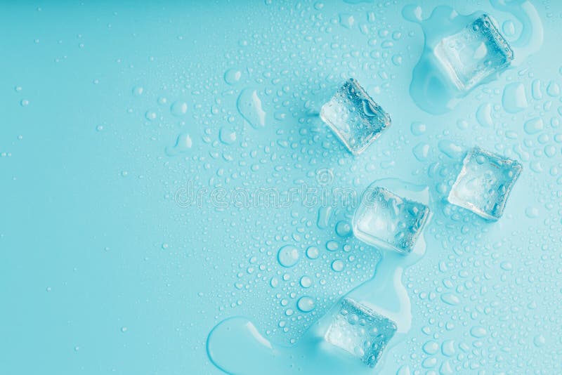 Ice Cube with Water Drops on a Blue Background. the Ice is Melting ...