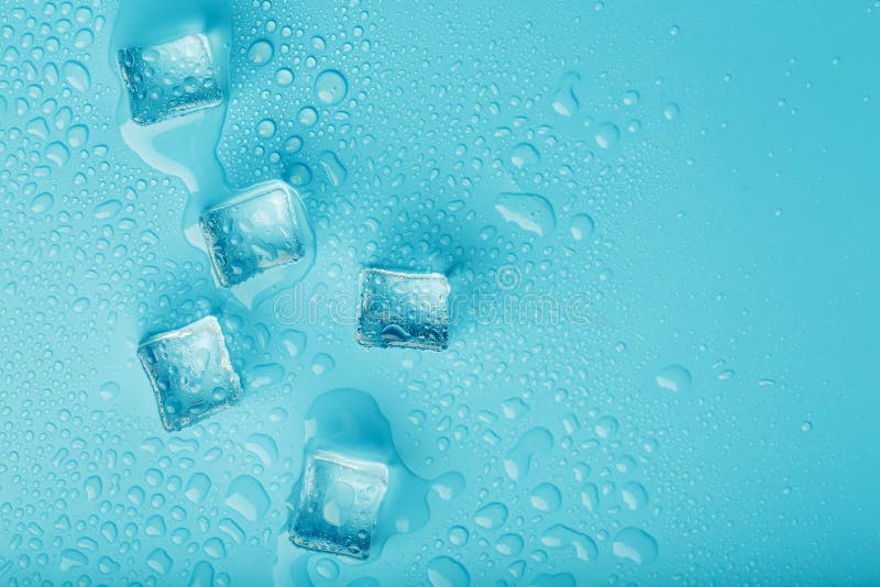Ice Cube with Water Drops on a Blue Background. the Ice is Melting ...