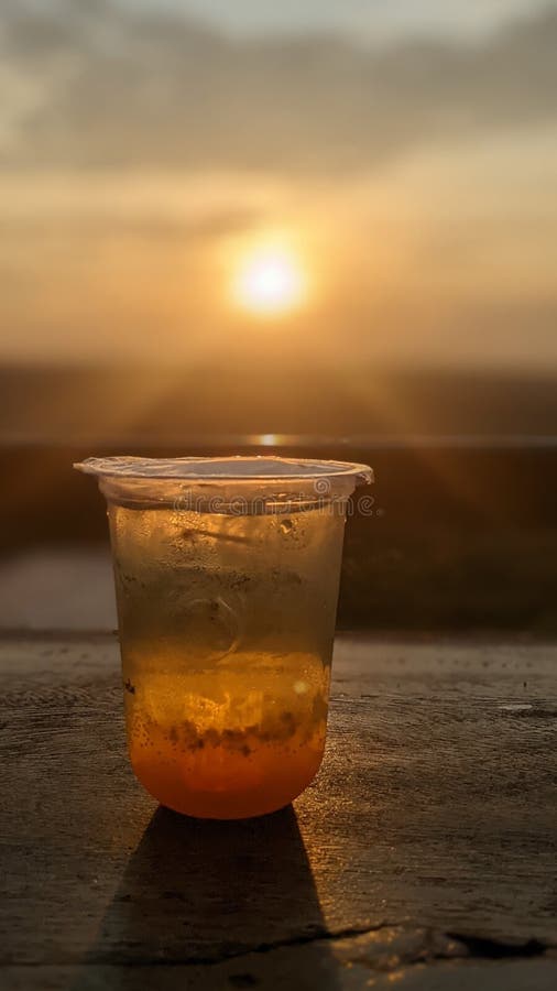 Ice Cup of Lemon Soda Under Sunset Stock Image - Image of yellow ...