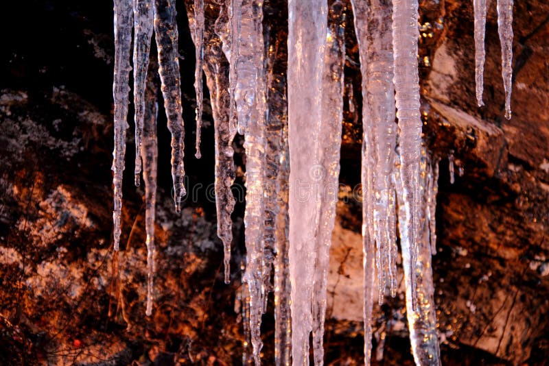 Ice Cycles on Rock in Morning Light Stock Photo - Image of rock, warm ...