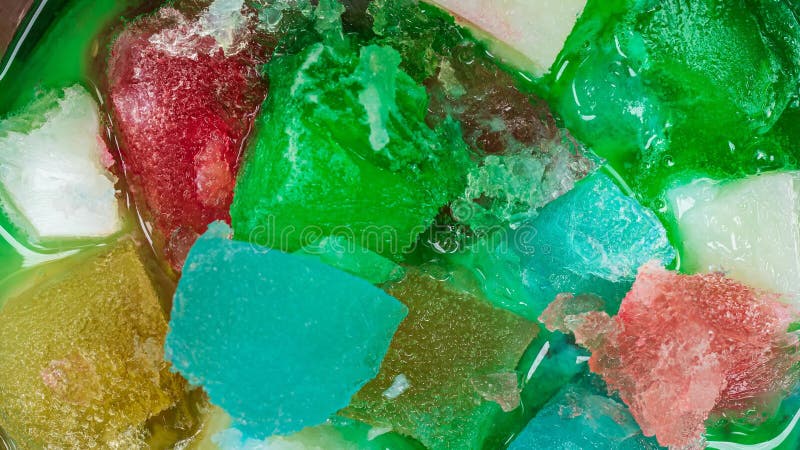 Ice of Different Colors Melting in a Bowl Stock Footage - Video of ...