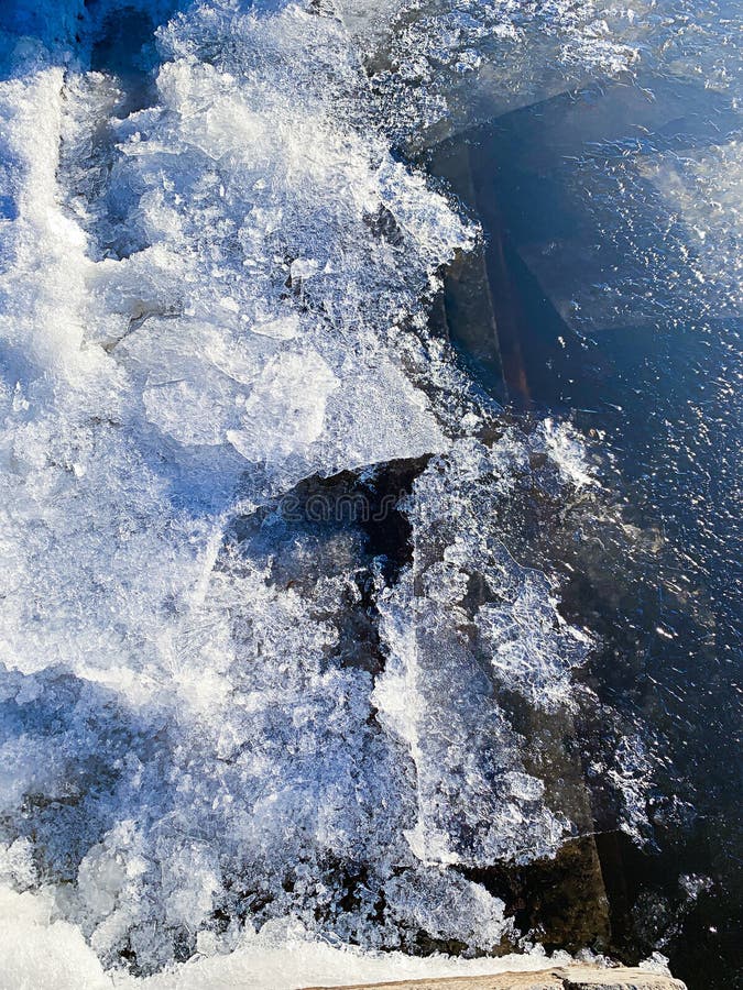 Ice Drift in the Spring on the River, Large Ice Floes on the Shore ...