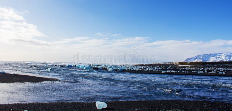 Ice Fields at the Black Pebble Beach, Coast of Iceland Stock Photo ...