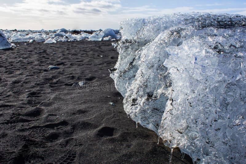 Ice Fields at the Black Pebble Beach, Coast of Iceland Stock Image ...