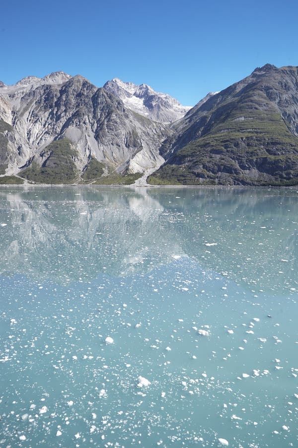 Ice Floating on Lake Surface with Mountains in Background in Alaska ...