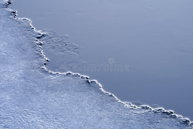 Ice Formation Along the Edge of a Frozen Lake Stock Image - Image of ...