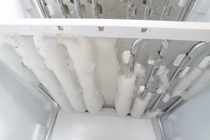 Ice in the Freezer, Defrosting of the Fridge and Freezer Stock Photo ...