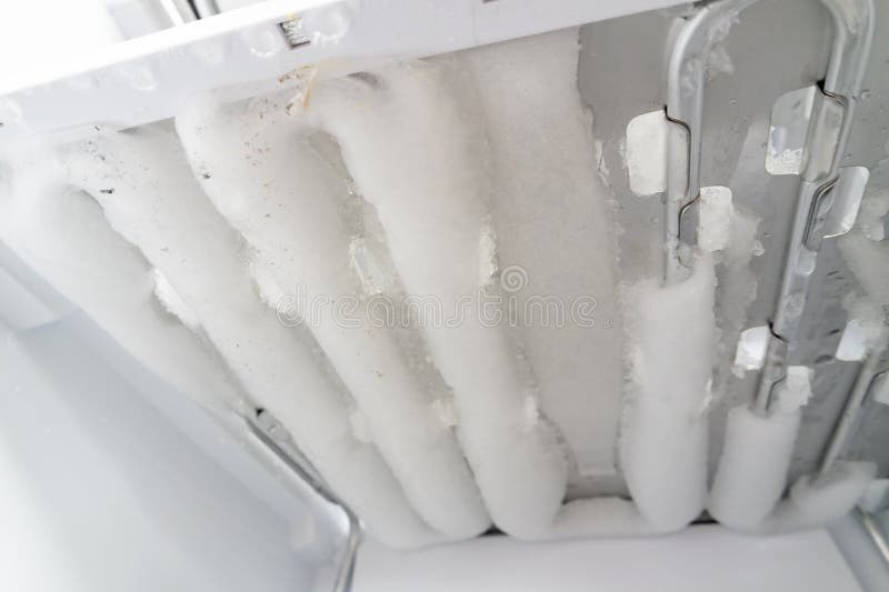 Ice in the Freezer, Defrosting of the Fridge and Freezer Stock Photo ...