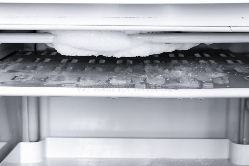Ice in fridge. Close-up. stock photo. Image of melting - 100860200