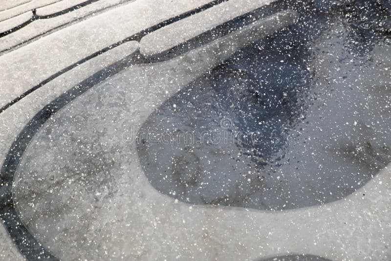 Ice. Frozen puddle stock photo. Image of frost, white - 82525782