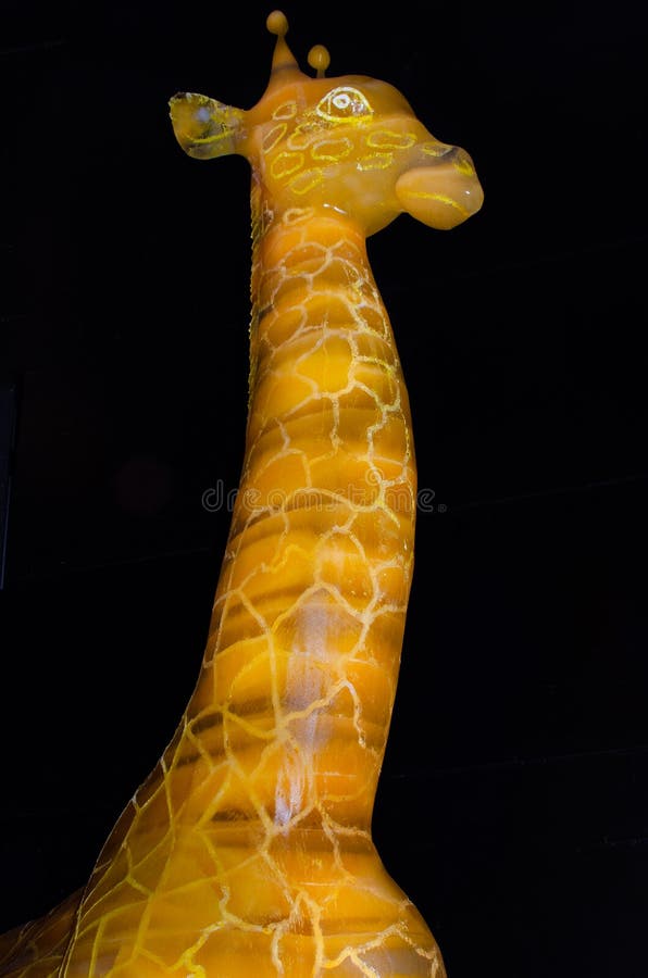 Ice Giraffe Sculpture on Black Background Editorial Photography - Image ...