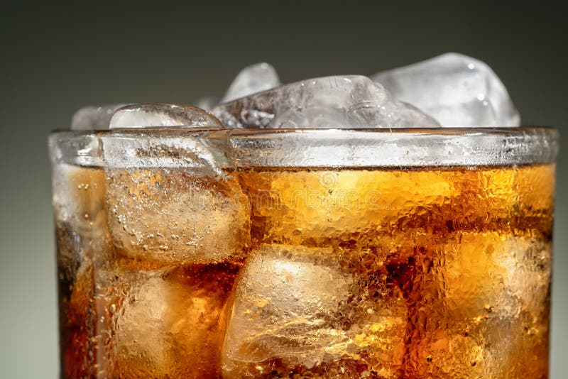 Cola with Ice. Close Up of the Ice Cubes in Cola Water Stock Photo ...