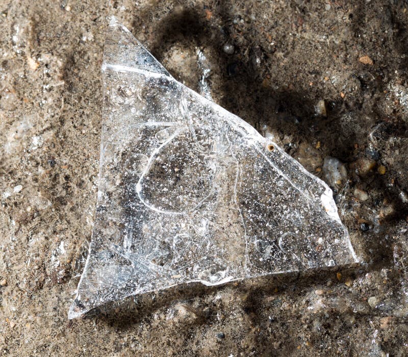 Ice on the Ground As a Background Stock Image - Image of melting ...