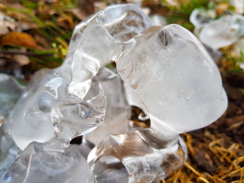 Ice on the Ground Next To the Grass Stock Photo - Image of light, glass ...