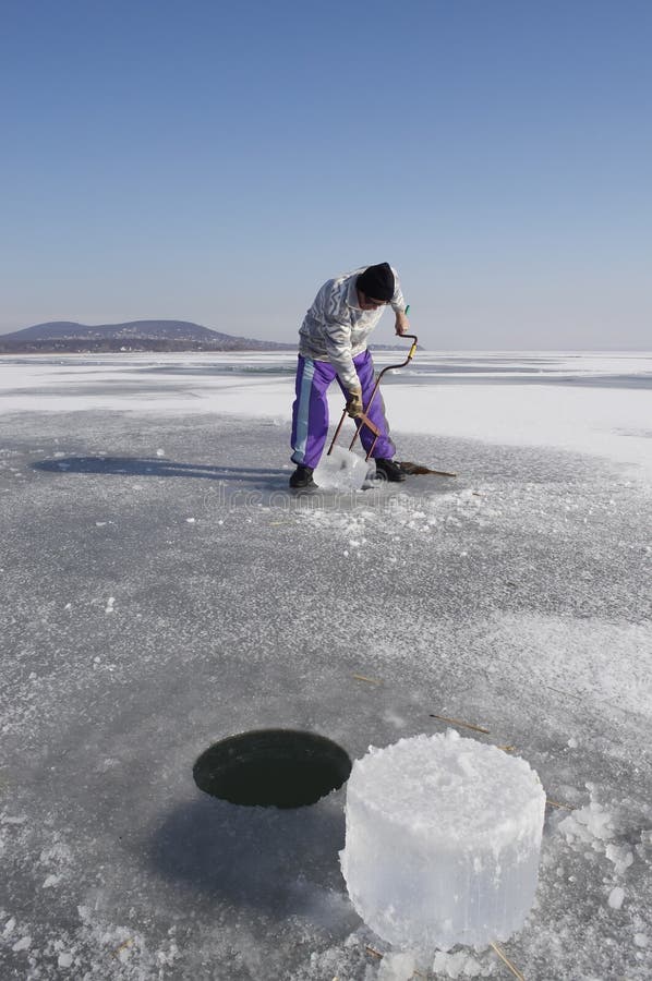 Ice hole boring stock image. Image of cold, hungary, time - 12860373