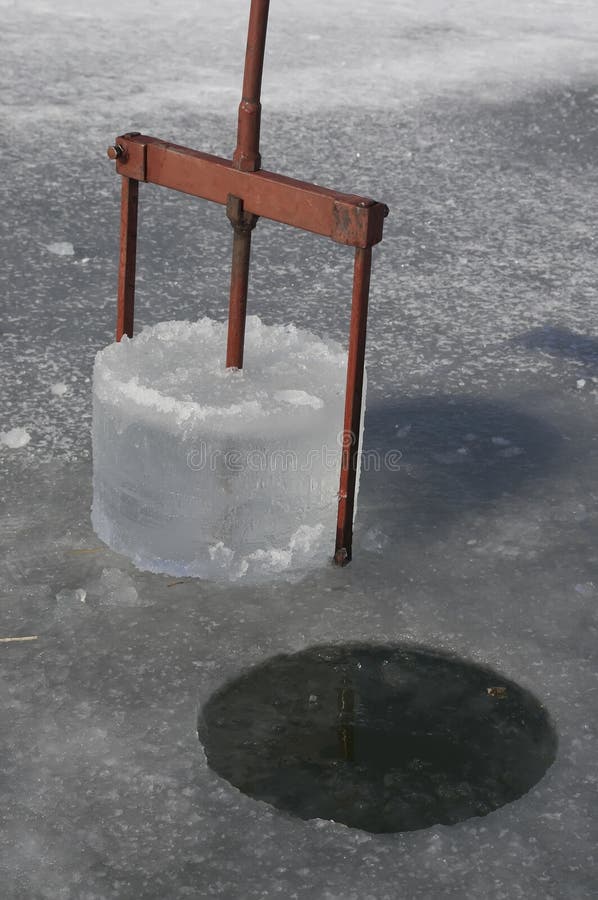 Ice hole boring stock photo. Image of cord, snow, blue - 12860408