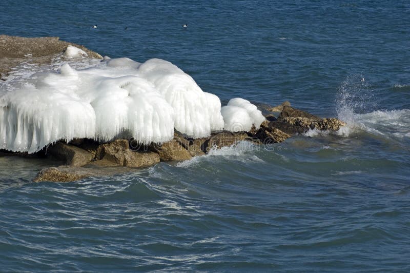 Ice island stock photo. Image of lake, stones, wave, sunset - 5559440