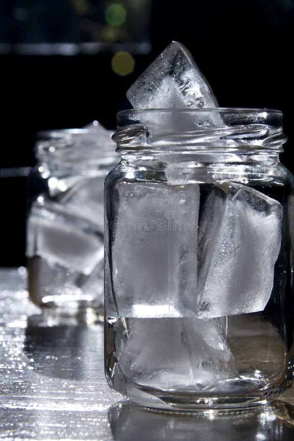 Ice Is Water Frozen Into A Solid State A Ice Cube`s Stock Image - Image ...