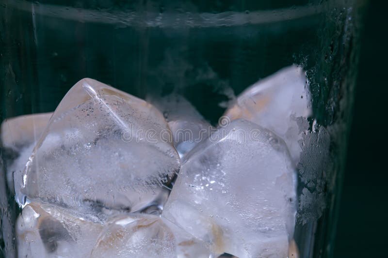 Ice Liquid in the Glass. Ice Cube Stock Image - Image of macro, danger ...