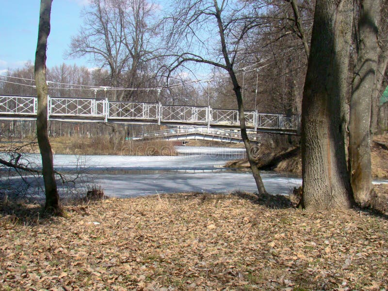 Spring Park View with Water and Bridge Stock Photo - Image of melting ...