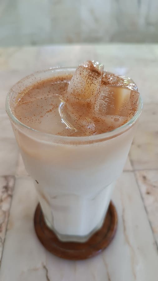 Ice milk with cinnamon stock image. Image of dairy, close - 254824775