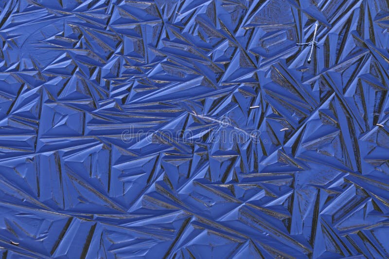 Pattern in Ice in a Stream with a Reflection of Color from the Sky ...