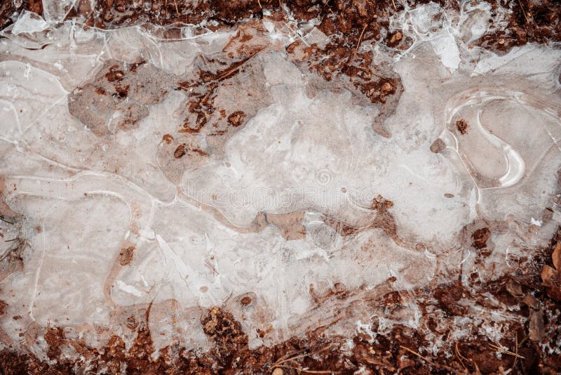 Ice Patterns on the Ground Resulting from Freezing. Pattern Stock Photo ...
