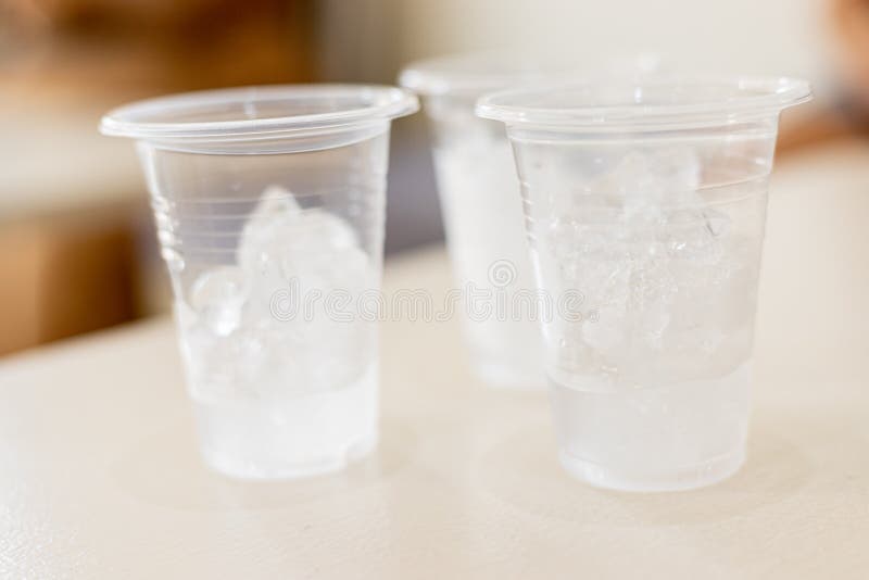 Ice in a plastic glass stock photo. Image of shape, people - 174516854