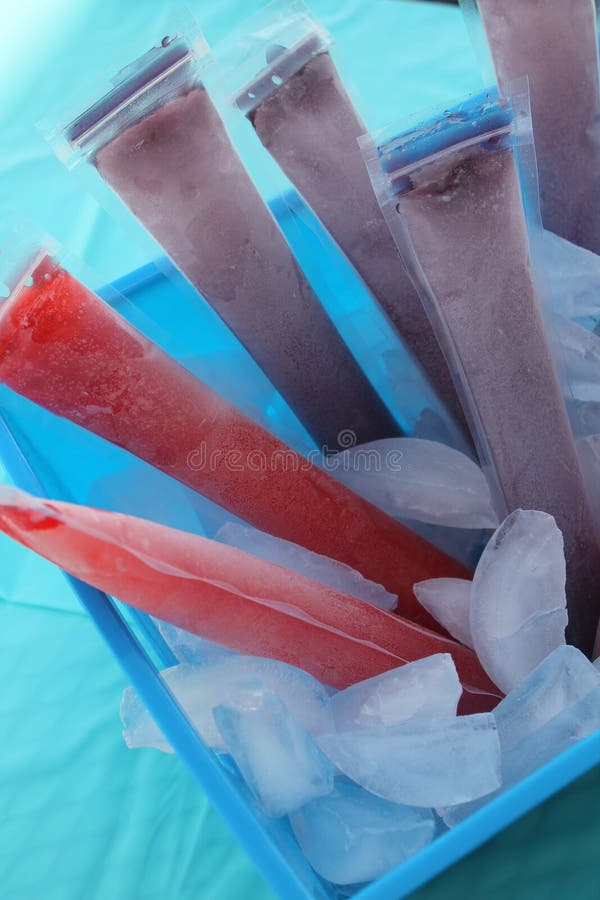 Ice Pops Frozen on Ice Outdoors Stock Photo - Image of fruity, frozen ...