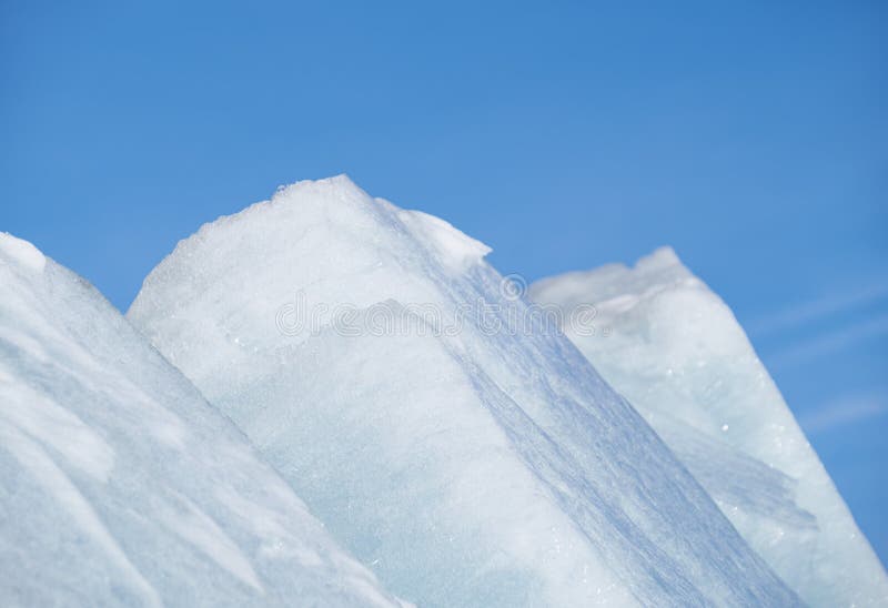 Ice Pyramids on Blue Sky Background Stock Photo - Image of winter ...