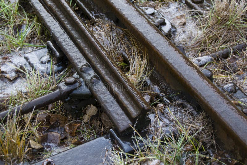 Ice on Rails and Metal Elements Stock Image - Image of rain, frozen ...