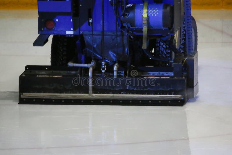The Ice Resurfacing Machine is Working during the Intermission of a ...