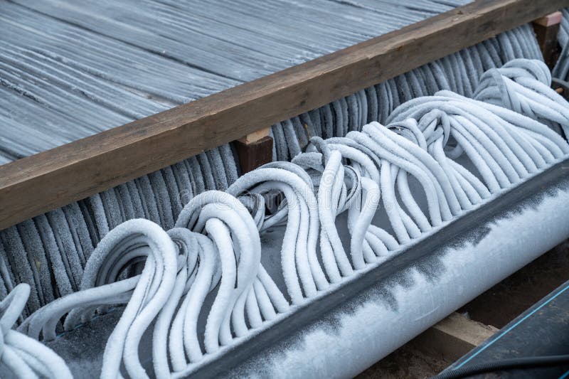 Ice Rink Cooling System Technology : Plastic Pipes Covered with Ice for ...