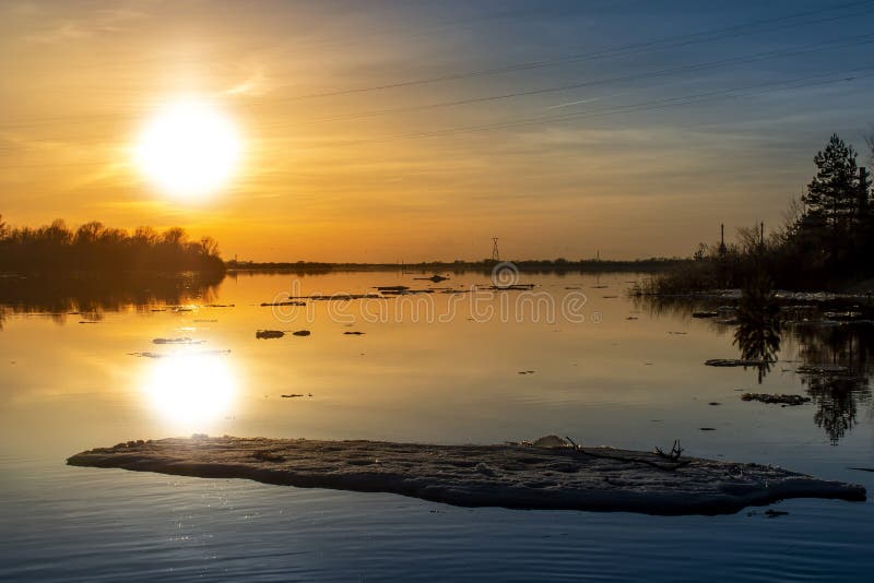 Ice on the River during the Ice Drift Lit by the Setting Sun in the ...
