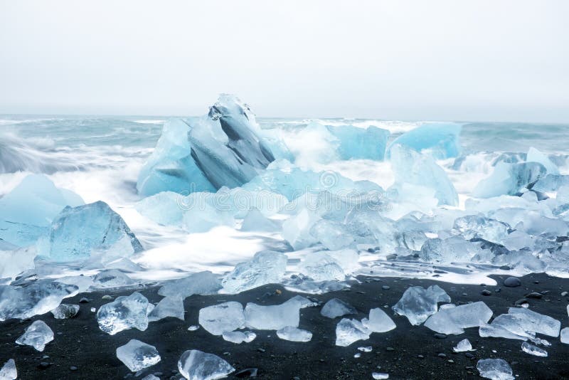 Ice Rocks on a Black Sand Beach in Iceland Stock Photo - Image of ...