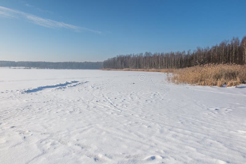 Ice Shell on a Lake Covered with Snow on a Sunny Winter Day As a ...