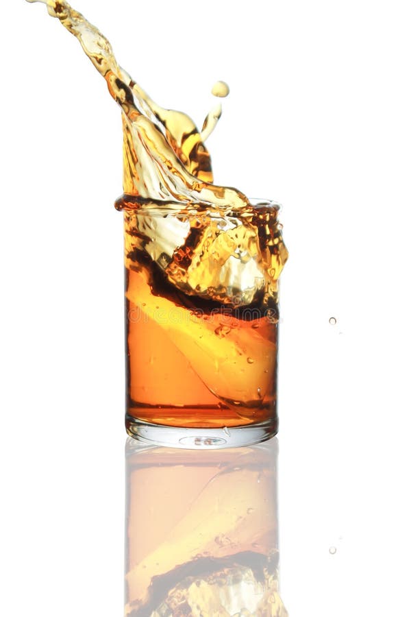 Shots of Ice Splashed into a Whiskey Glass,with Clipping Path Stock ...
