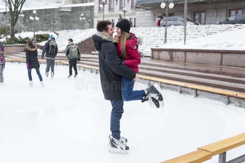 Ice Skating Couple Having Winter Fun on Ice Skates Stock Image - Image ...