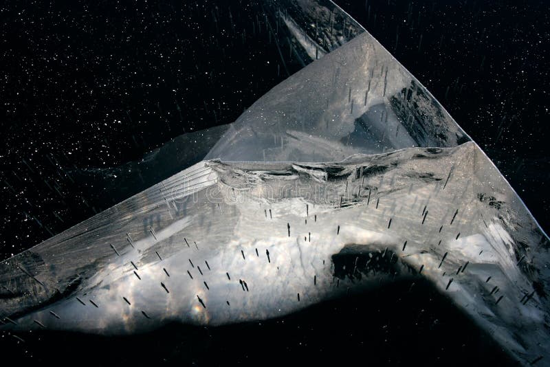 Ice space stock image. Image of frozen, black, pattern - 78990917