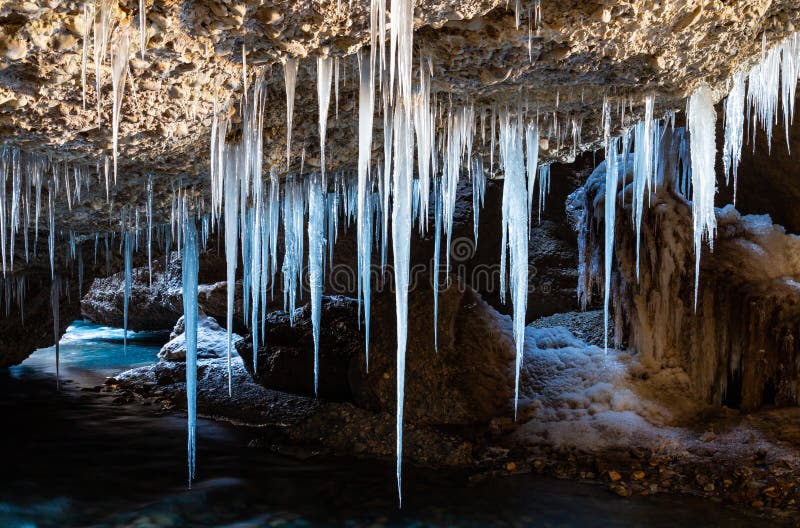 Ice Stalactites in the Cave Stock Photo - Image of amazing, blue: 138124934