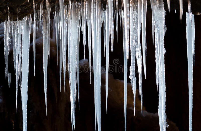 Ice Stalactites in the Cave Stock Photo - Image of amazing, blue: 138124934