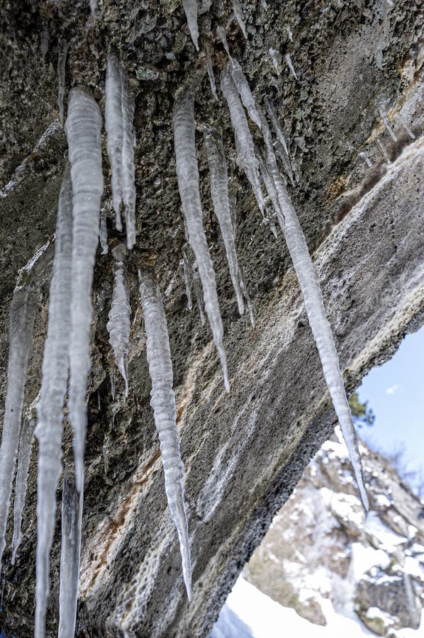 Ice stalactites in a cave stock photo. Image of cold - 267148524